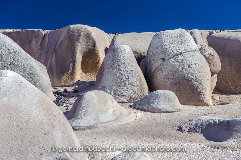 Round rock formations polished by wind and sand in the Atacama Desert ...